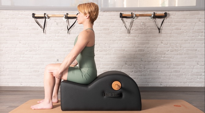 Pilates on a spine corrector….roll up - AthensTrainers®